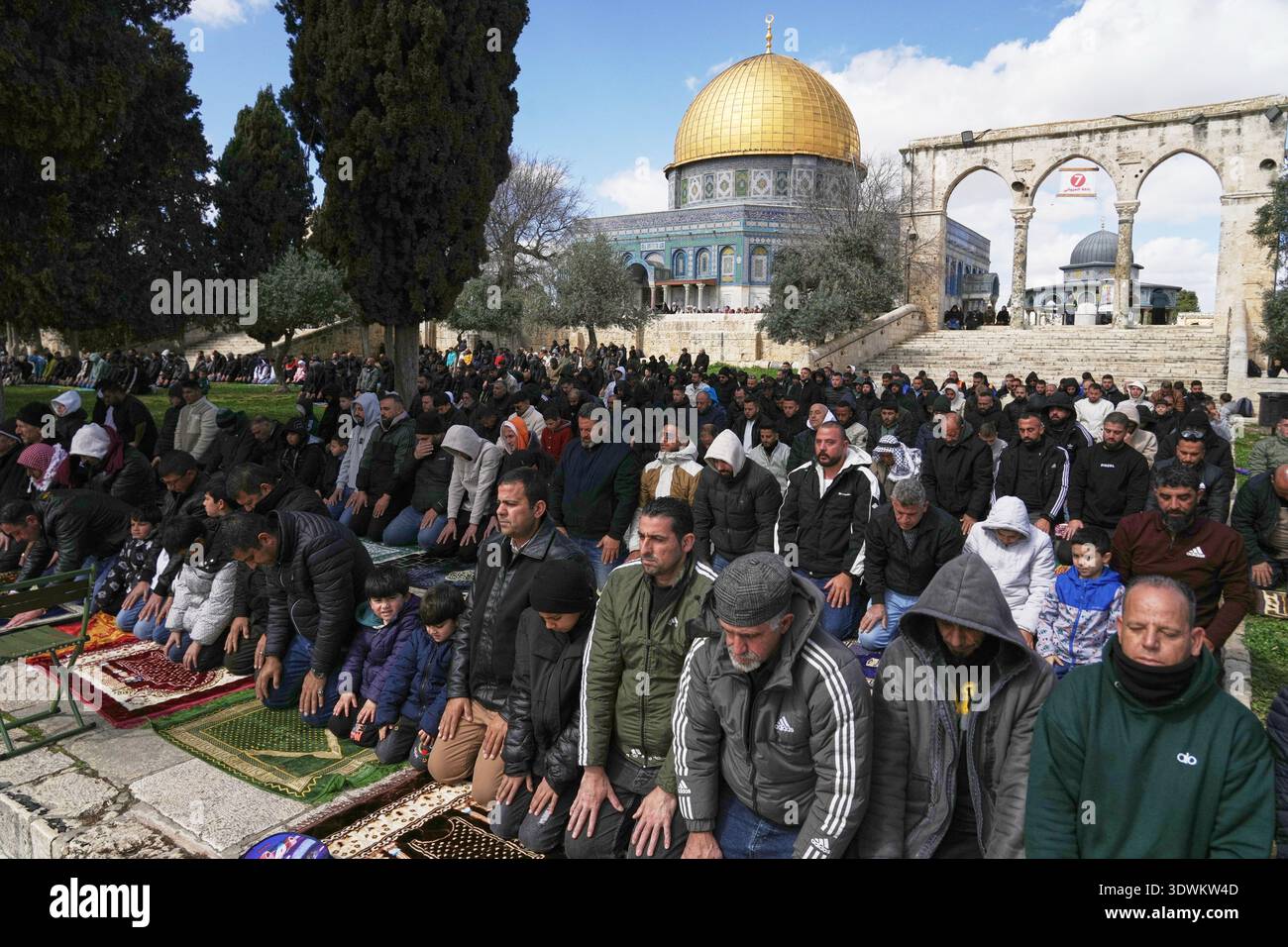 Worshippers pray during Friday prayers at the Al-Aqsa Mosque compound ...