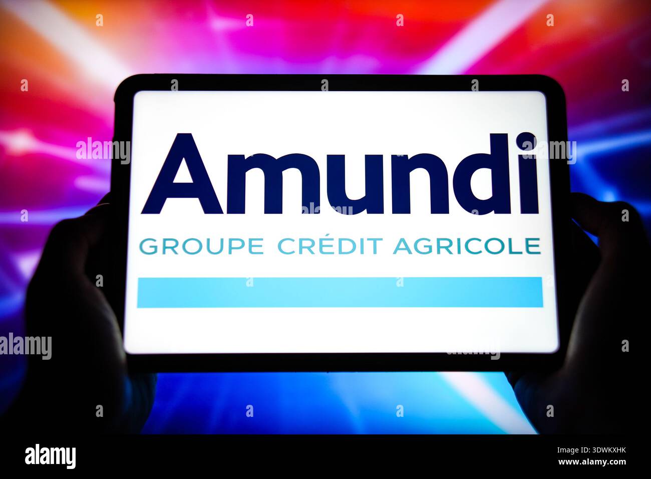 In this photo illustration, the Amundi logo is displayed on the screen ...