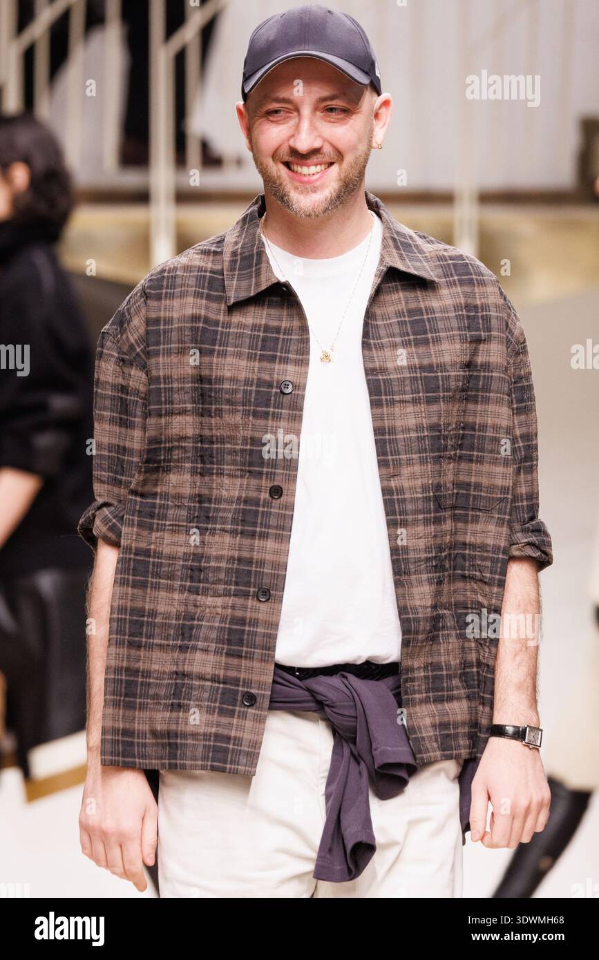 Fashion designer Matteo Tamburini walks the runway at the Tod's fashion ...