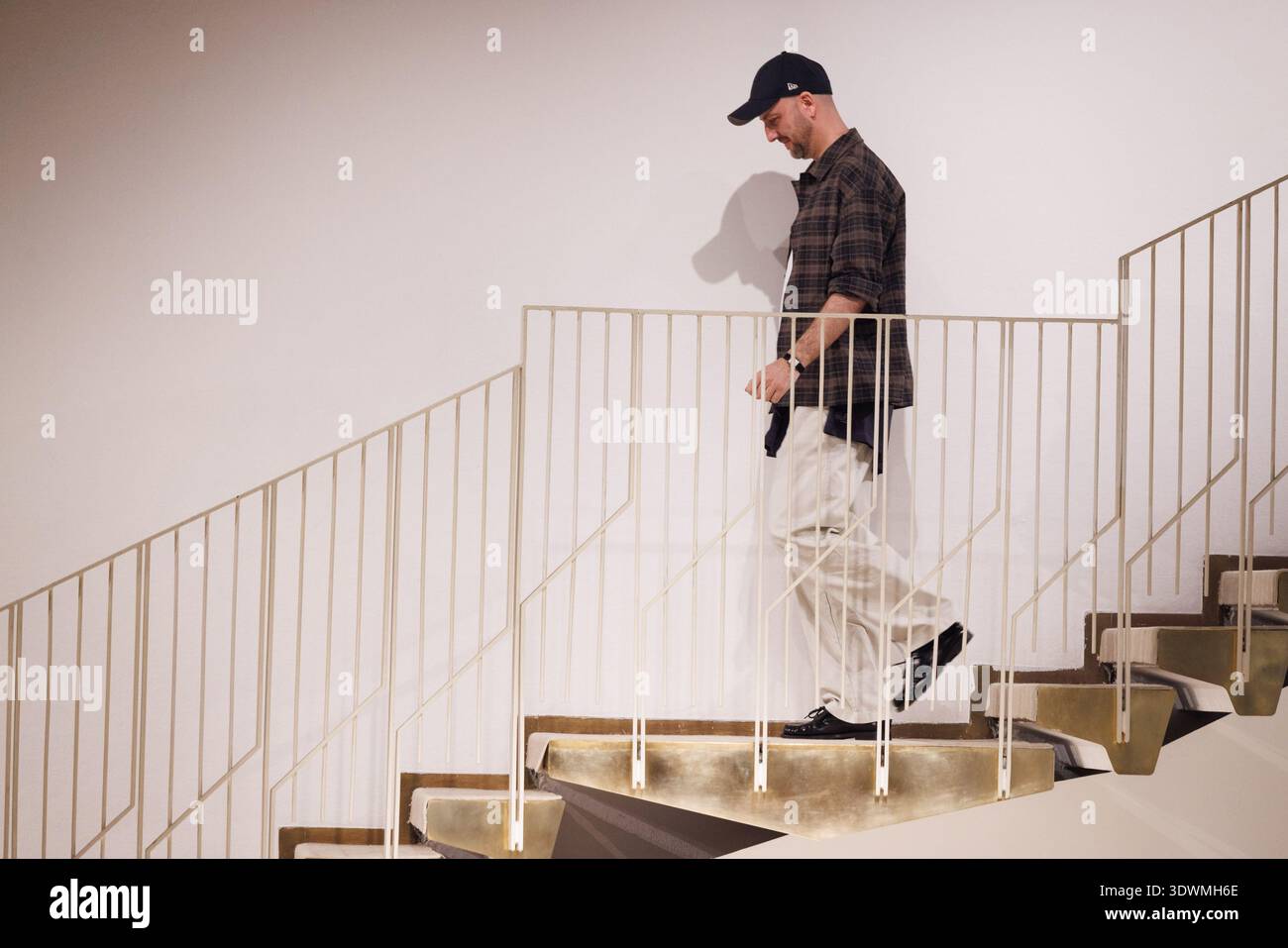 Fashion designer Matteo Tamburini walks the runway at the Tod's fashion ...