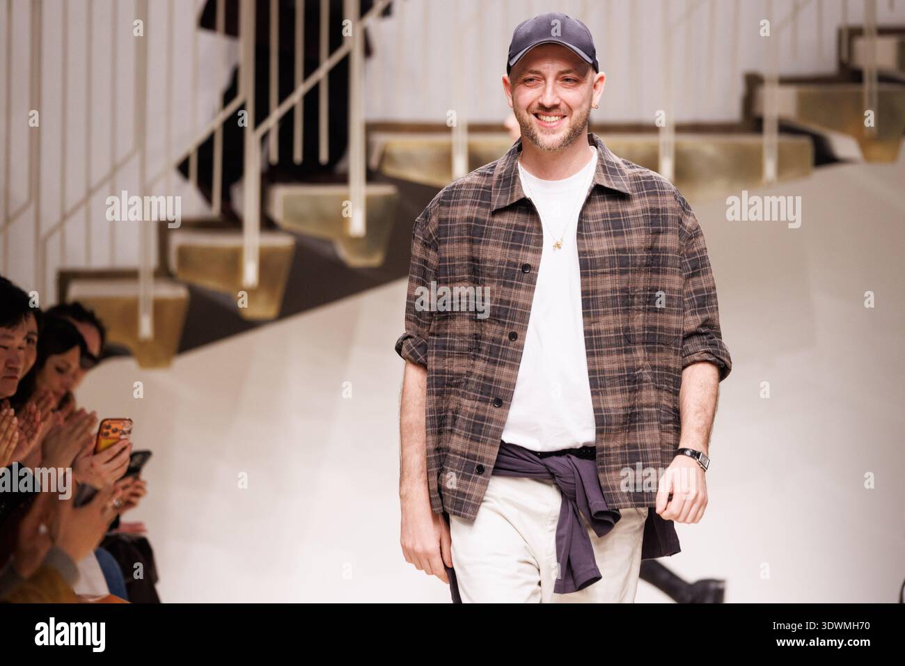 Fashion designer Matteo Tamburini walks the runway at the Tod's fashion ...