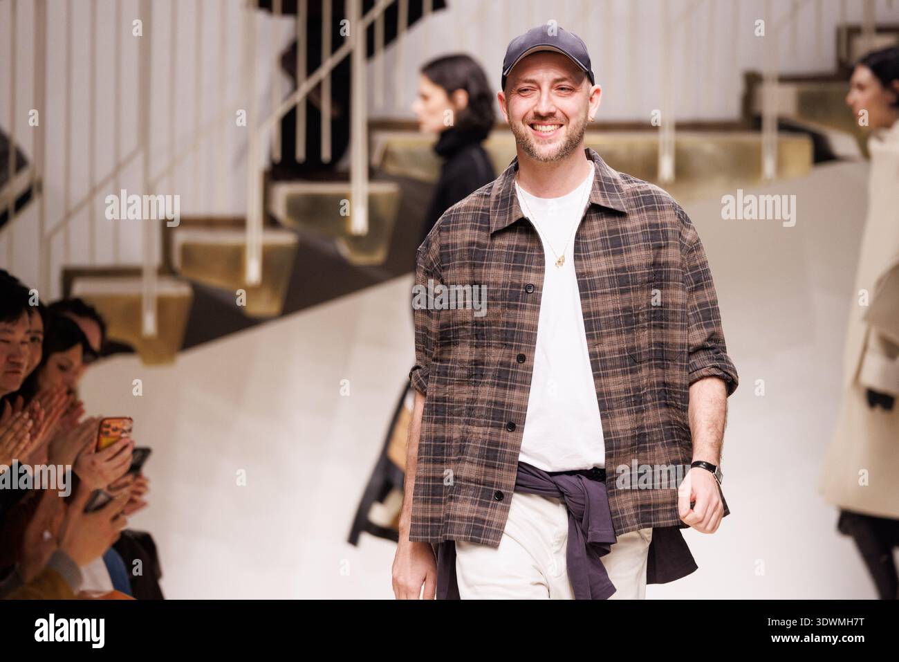 Fashion designer Matteo Tamburini walks the runway at the Tod's fashion ...