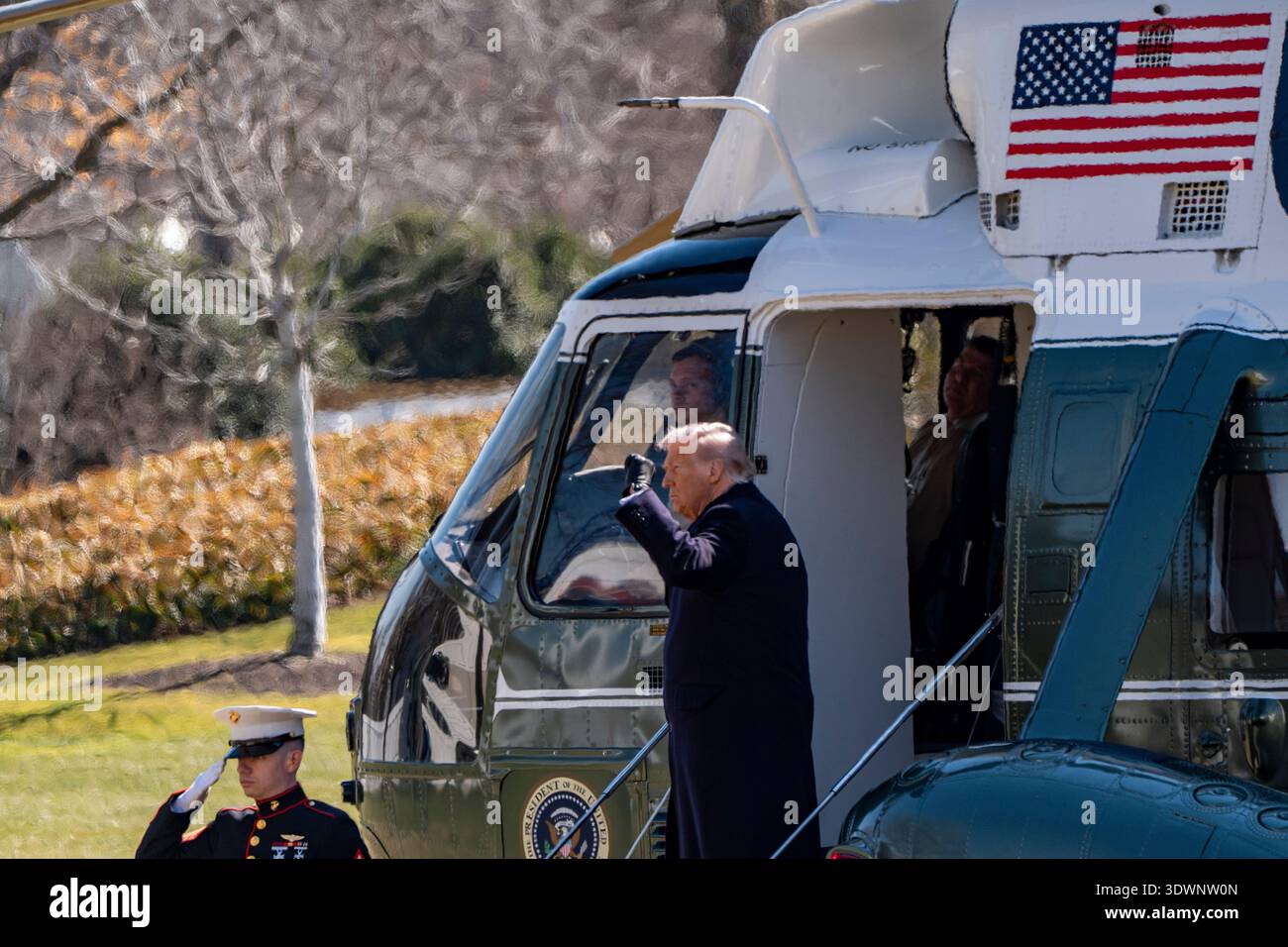 President Donald Trump gestures to supporters before departing on ...