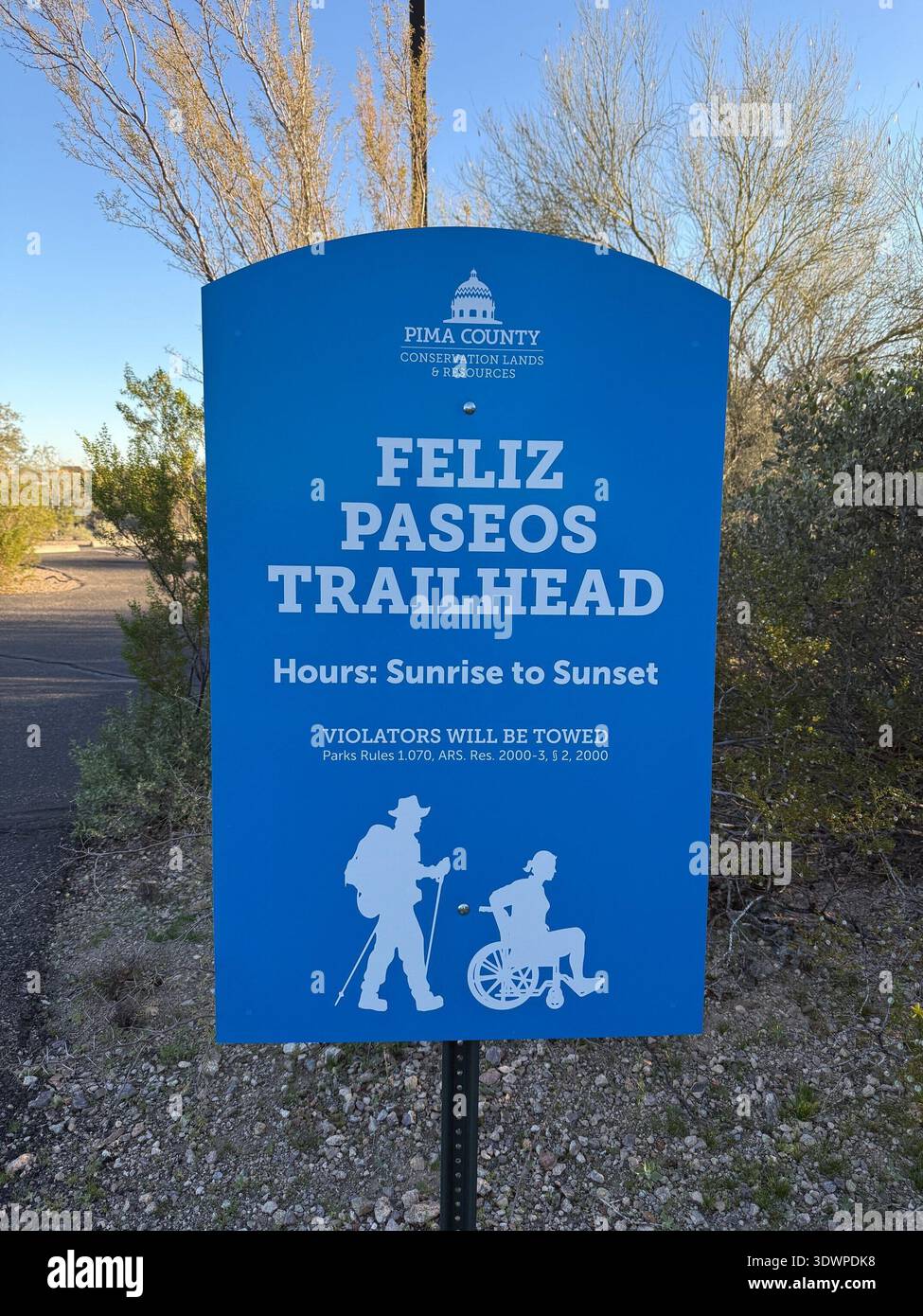 A sign for the Feliz Paseos trailhead is displayed at the park in ...