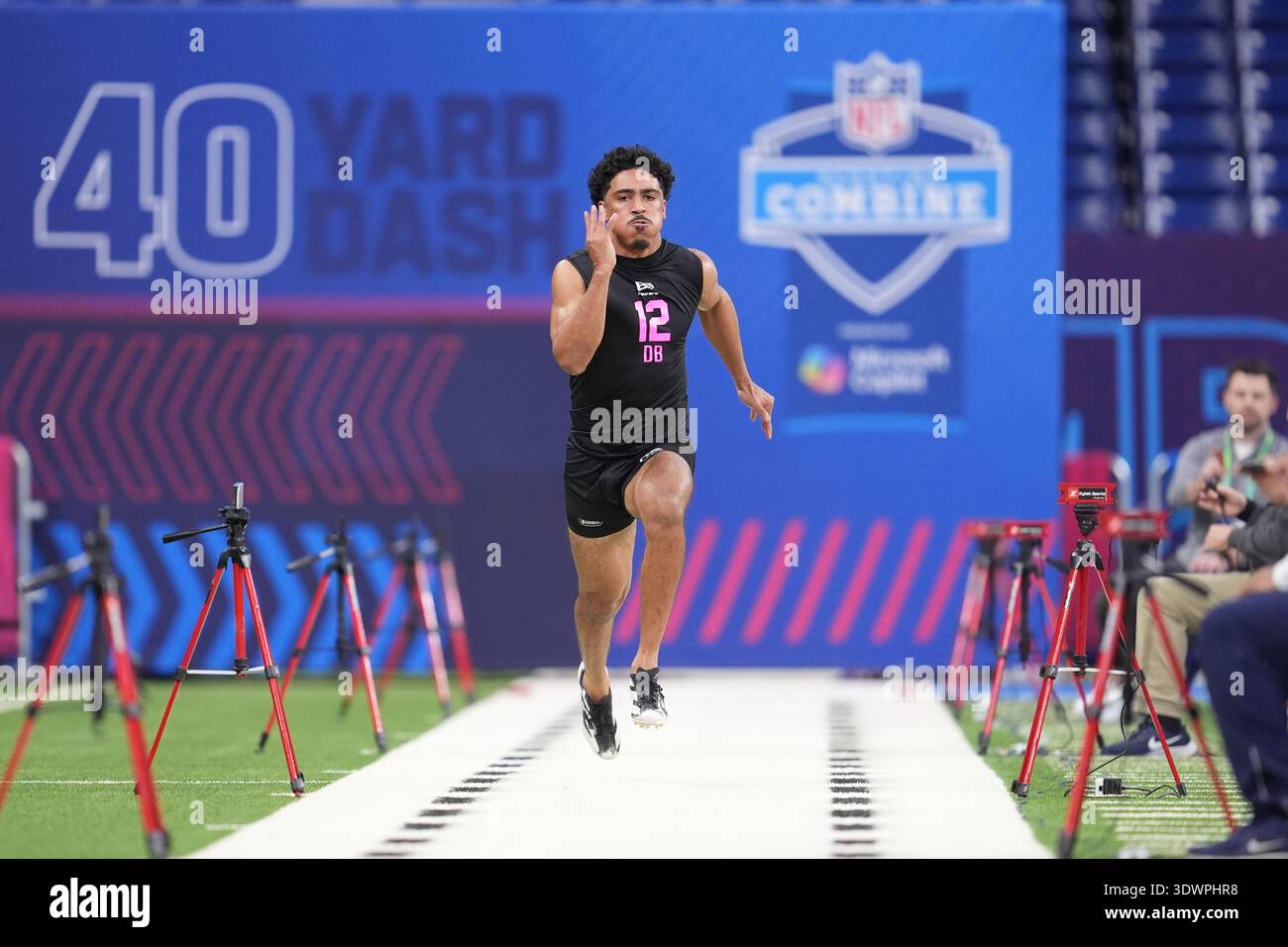 Iowa defensive back TJ Hall (12) runs the 40-yard dash at the NFL ...