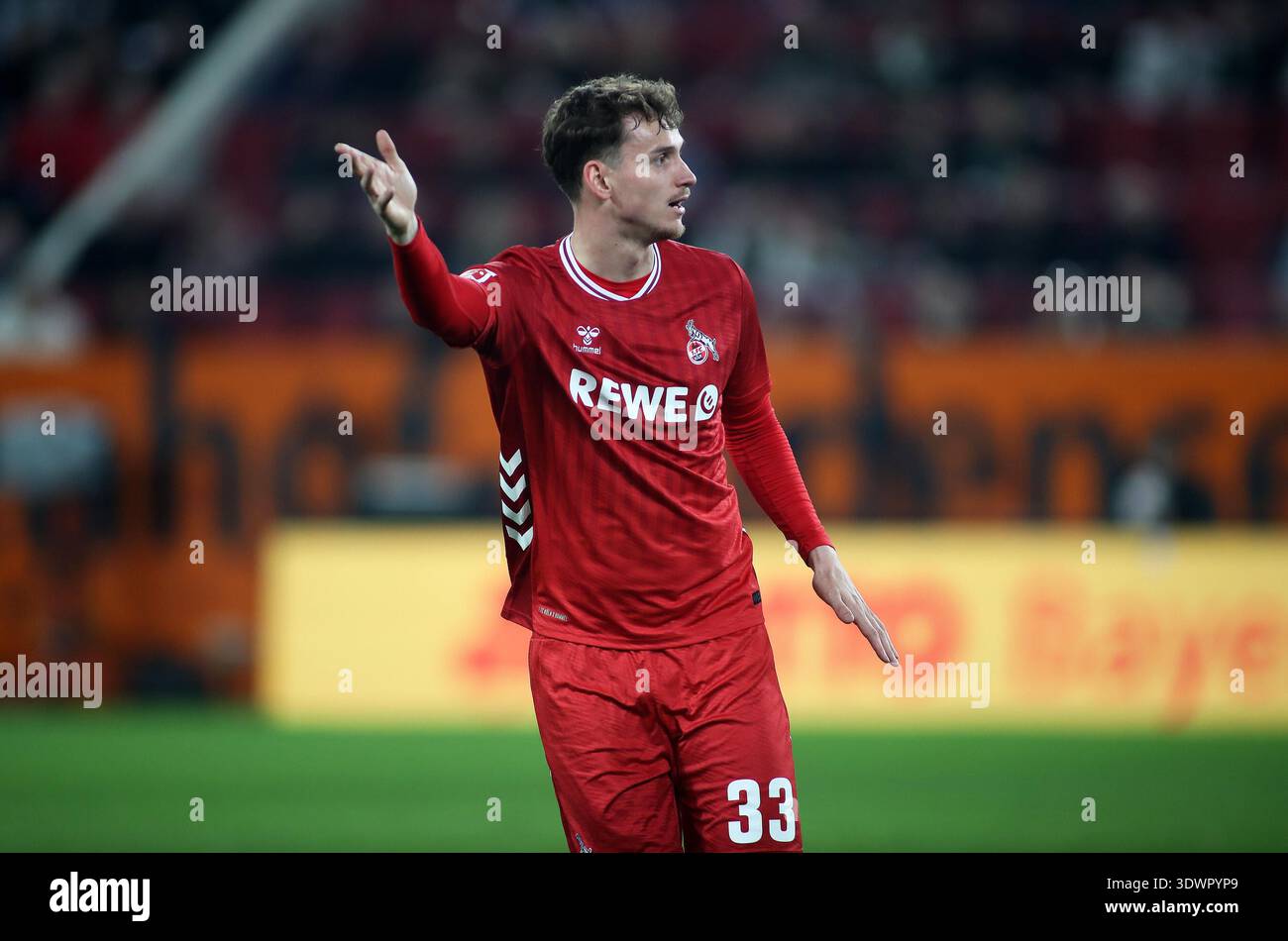 Rav van den berg 1 fc cologne raises his right arm hi-res stock ...