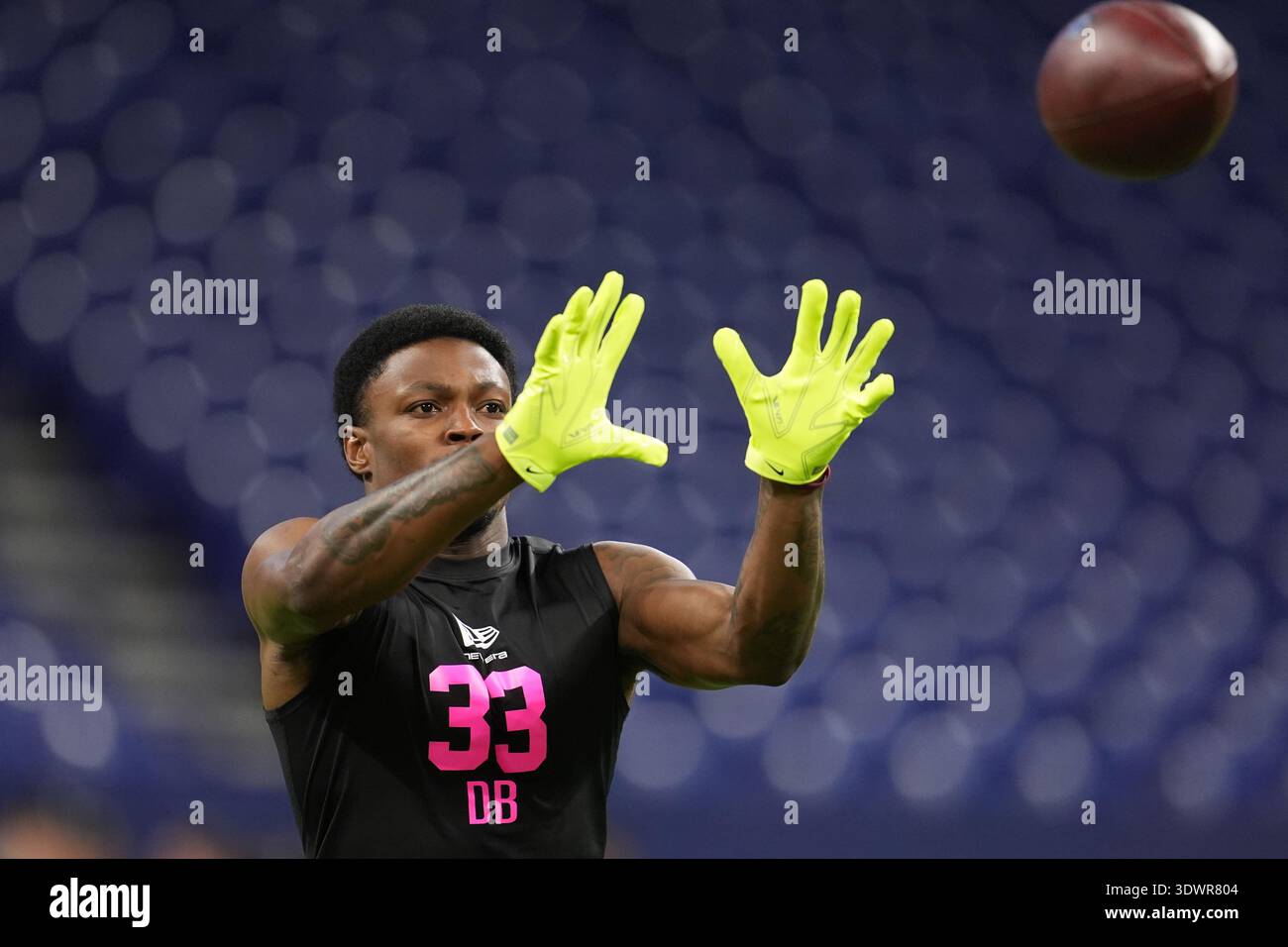 TCU defensive back Bud Clark (33) runs a drill at the NFL football ...