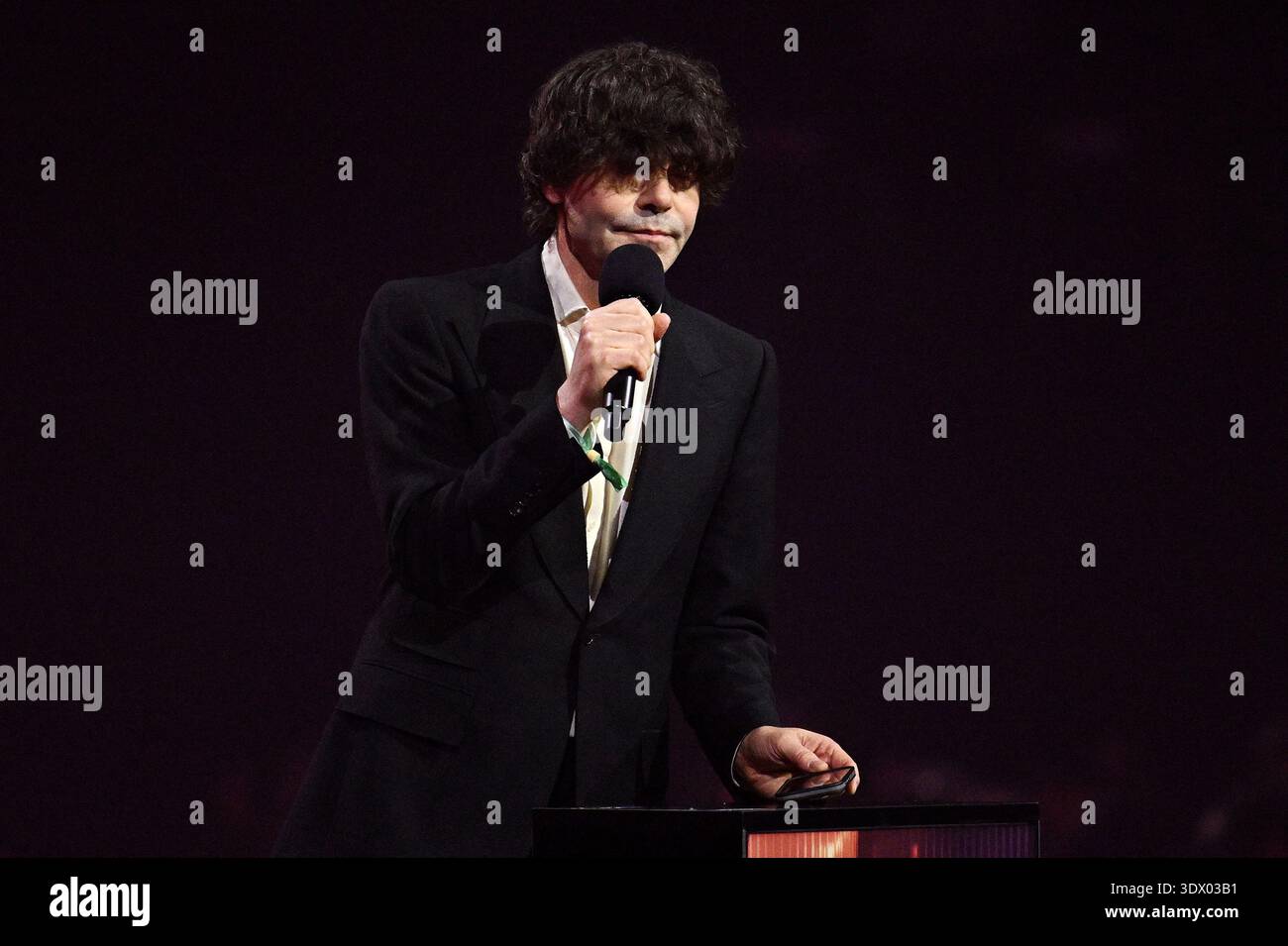 Tim Burgess presents the In Memoriam section during the Brit Awards ...