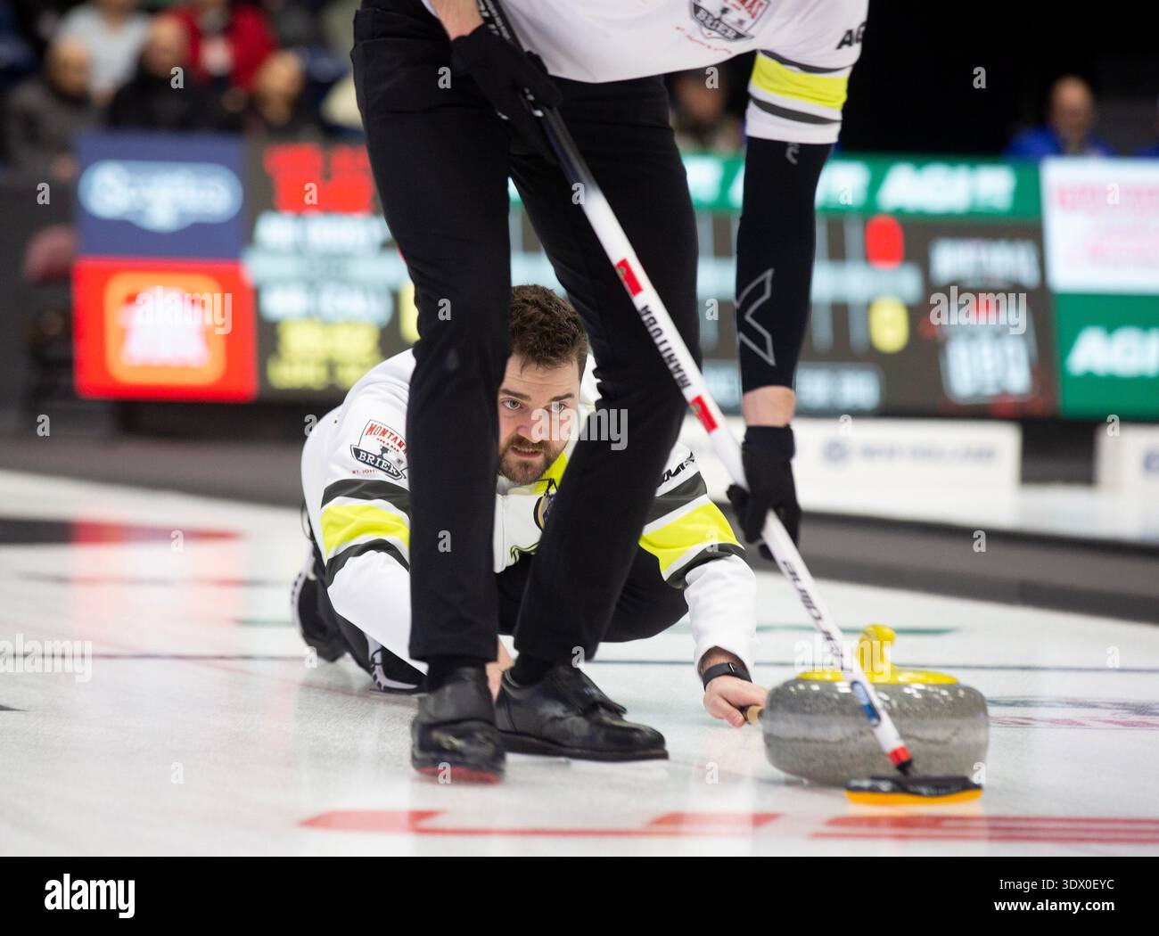 Team Manitoba Skip, Matthew Dunstone releases his rock during Draw 2 at ...