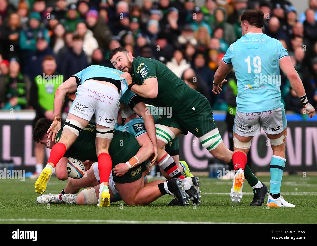 Galway, Ireland. 28th February, 2026. Connacht's Billy Bohan is tackled ...