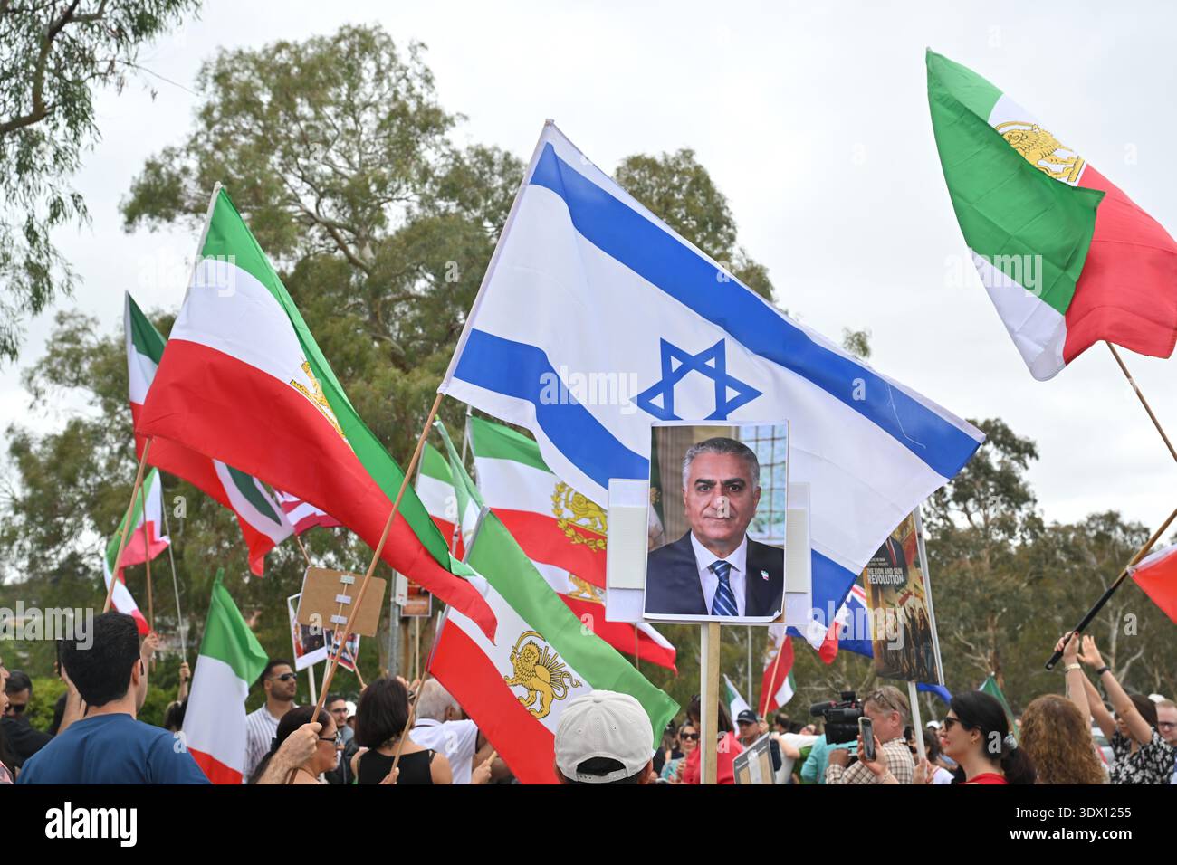 Iranian Australians celebrate outside Iran’s embassy, the United States ...