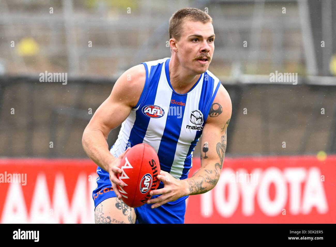 Cameron Zurhaar of the Kangaroos in action during the AFL Community ...