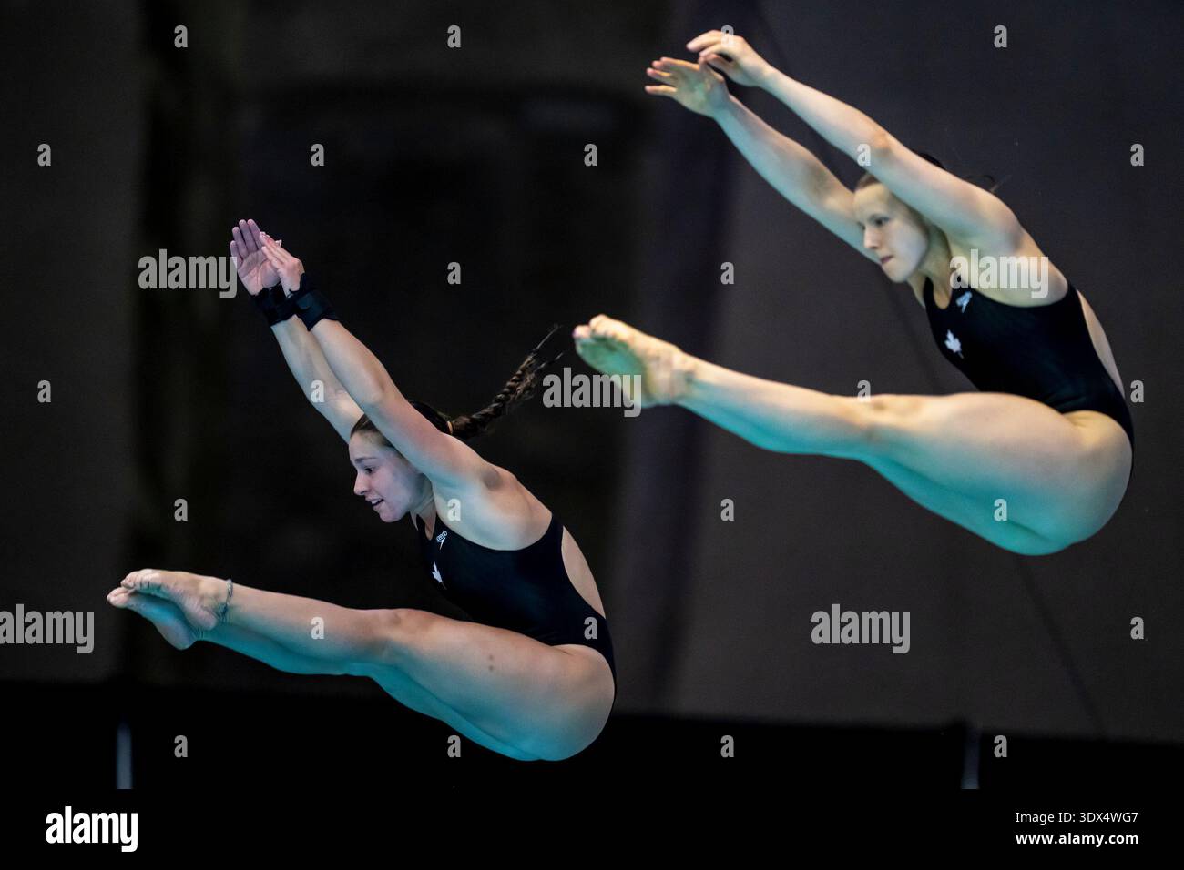 Team Canada's Amelie-Laura Jasmin and Mia Vallee compete in the women's ...