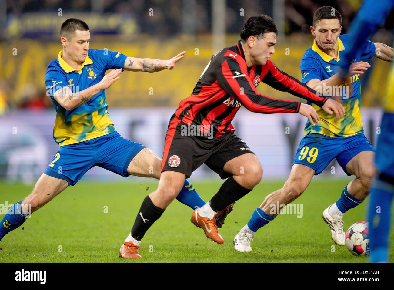 FC Midtjylland's Aral Simsir in battle with Broendby's Oliver Villadsen ...