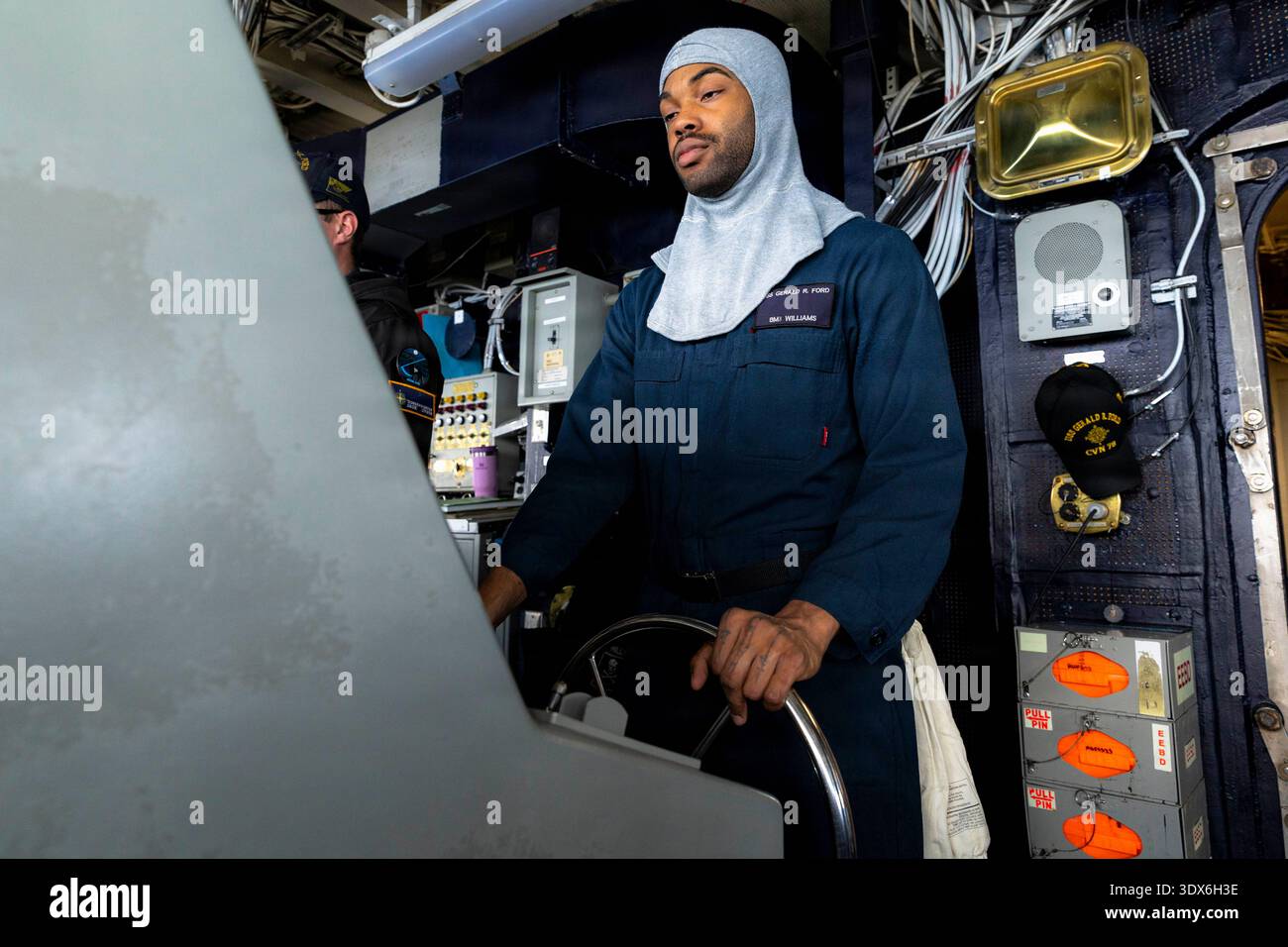 This image provided by U.S. Central Command shows a Navy sailor ...