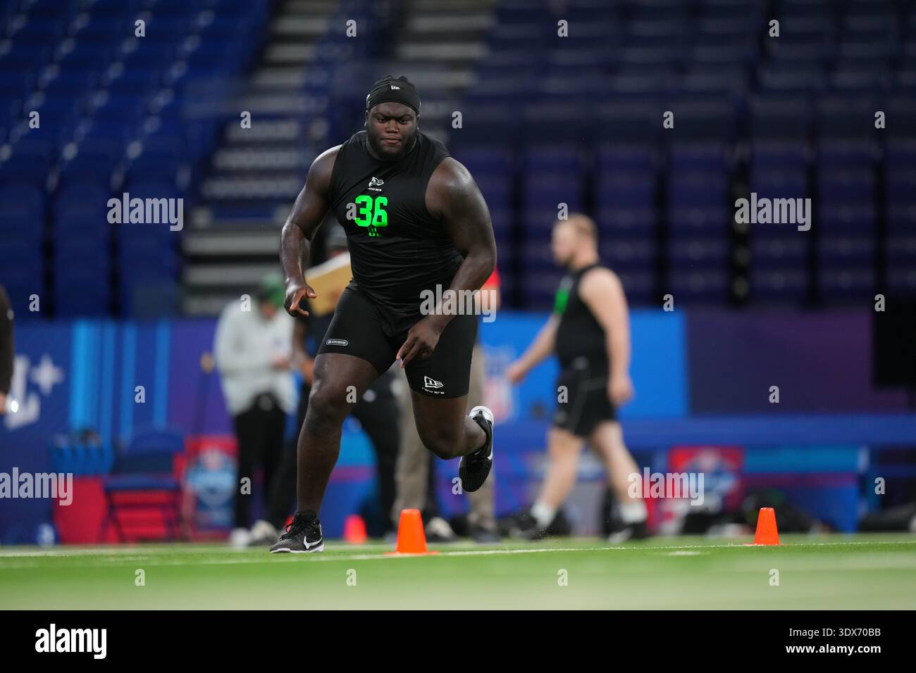 Georgia offensive lineman Micah Morris (36) runs a drill at the NFL ...
