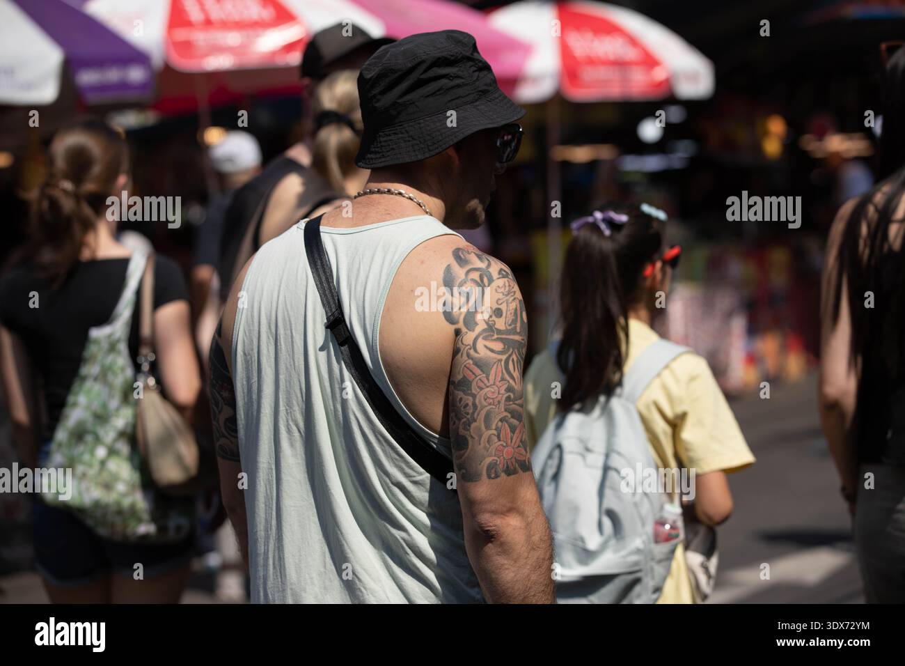 BANGKOK, THAILAND-FEB 1, 2026: Shoulder skin and tattoo detail of a man ...
