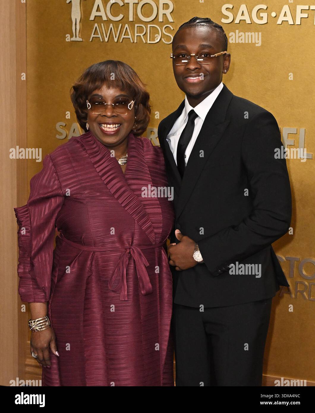 Toni Lynn Washington and Miles Caton arriving at the 32nd Annual Actor ...