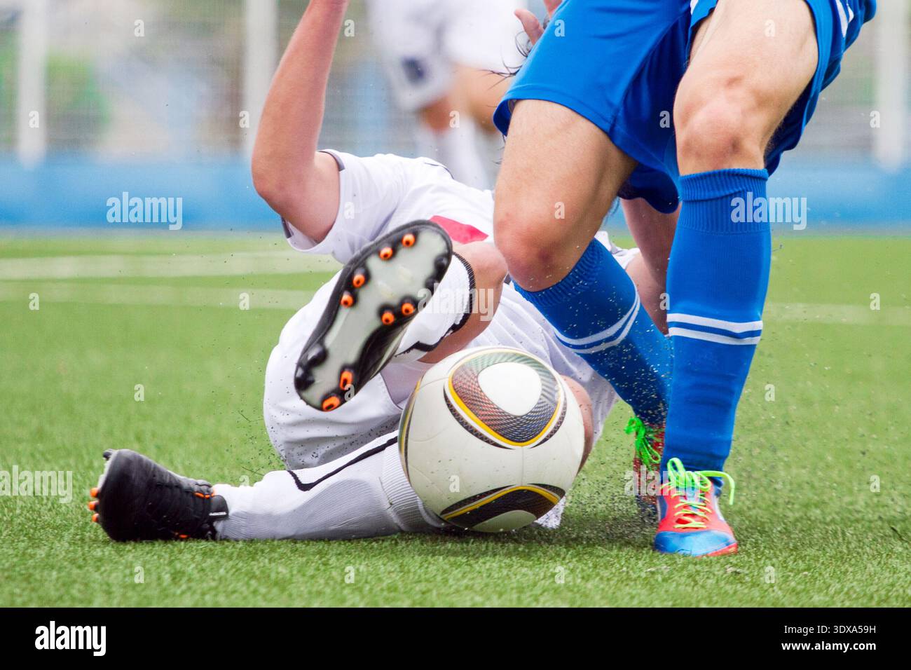 Football action shot hi-res stock photography and images - Alamy