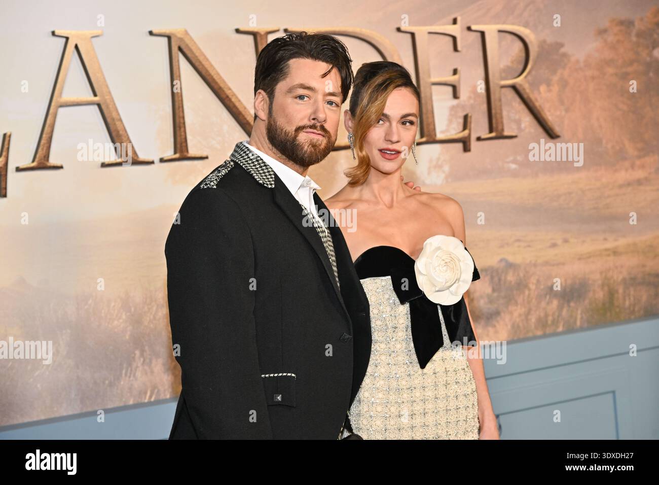 Richard Rankin, left, and Sophie Skelton attend the STARZ premiere of ...