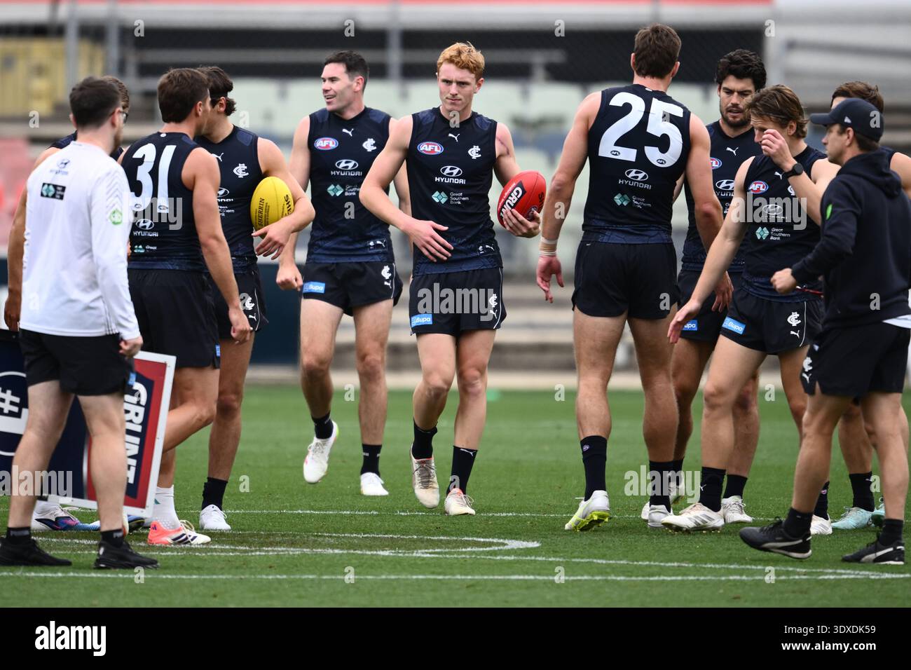 Harry Dean of Carlton (centre) during an AFL training session at IKON ...