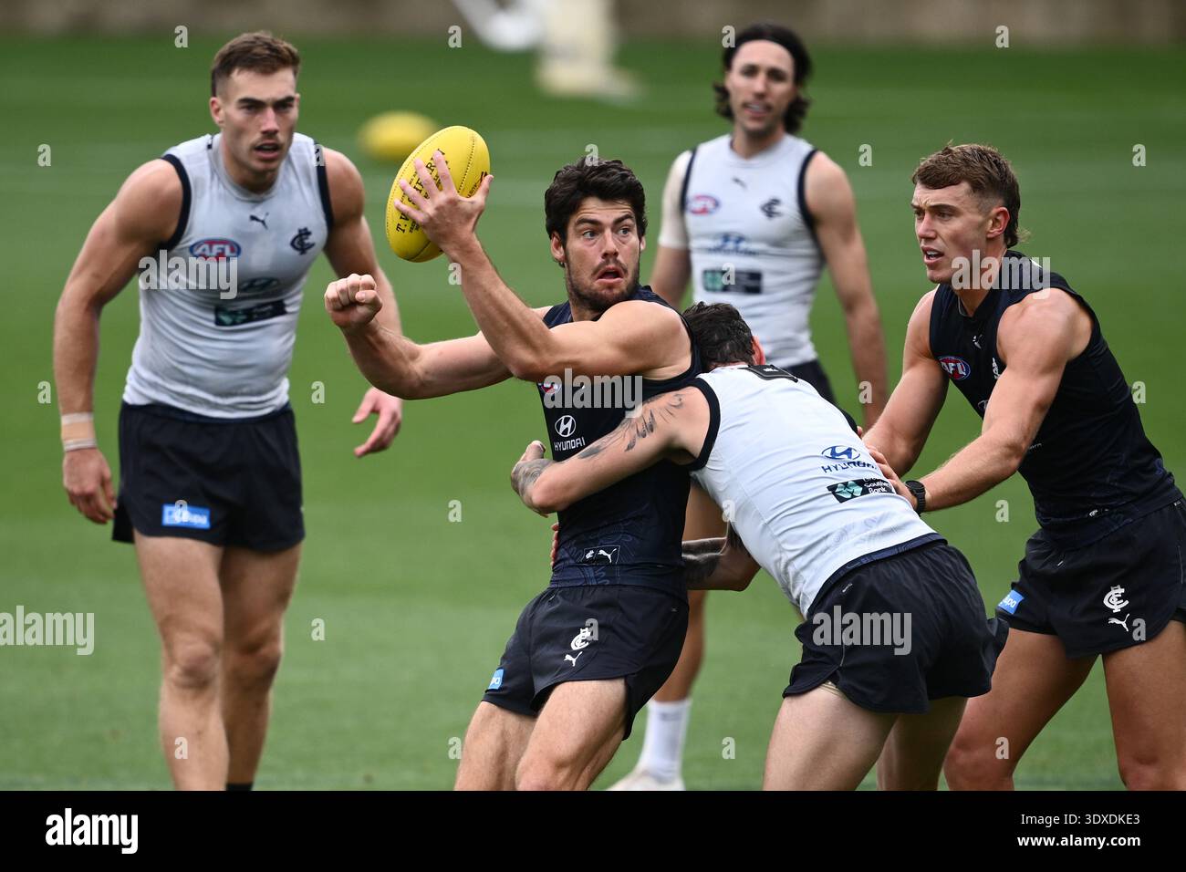 George Hewett of Carlton (centre) during an AFL training session at ...