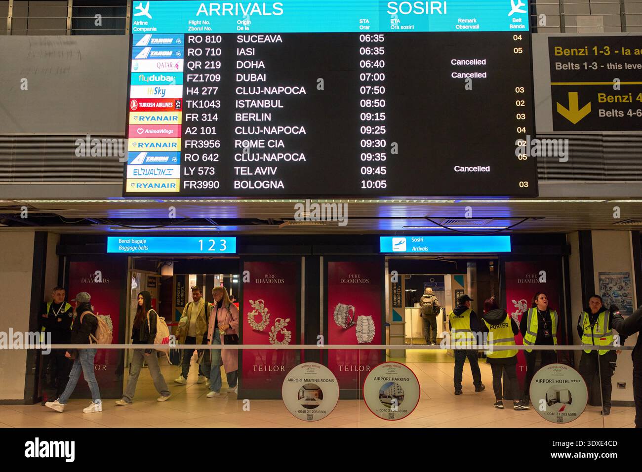 A display in the arrivals terminal of the Henri Coanda International ...