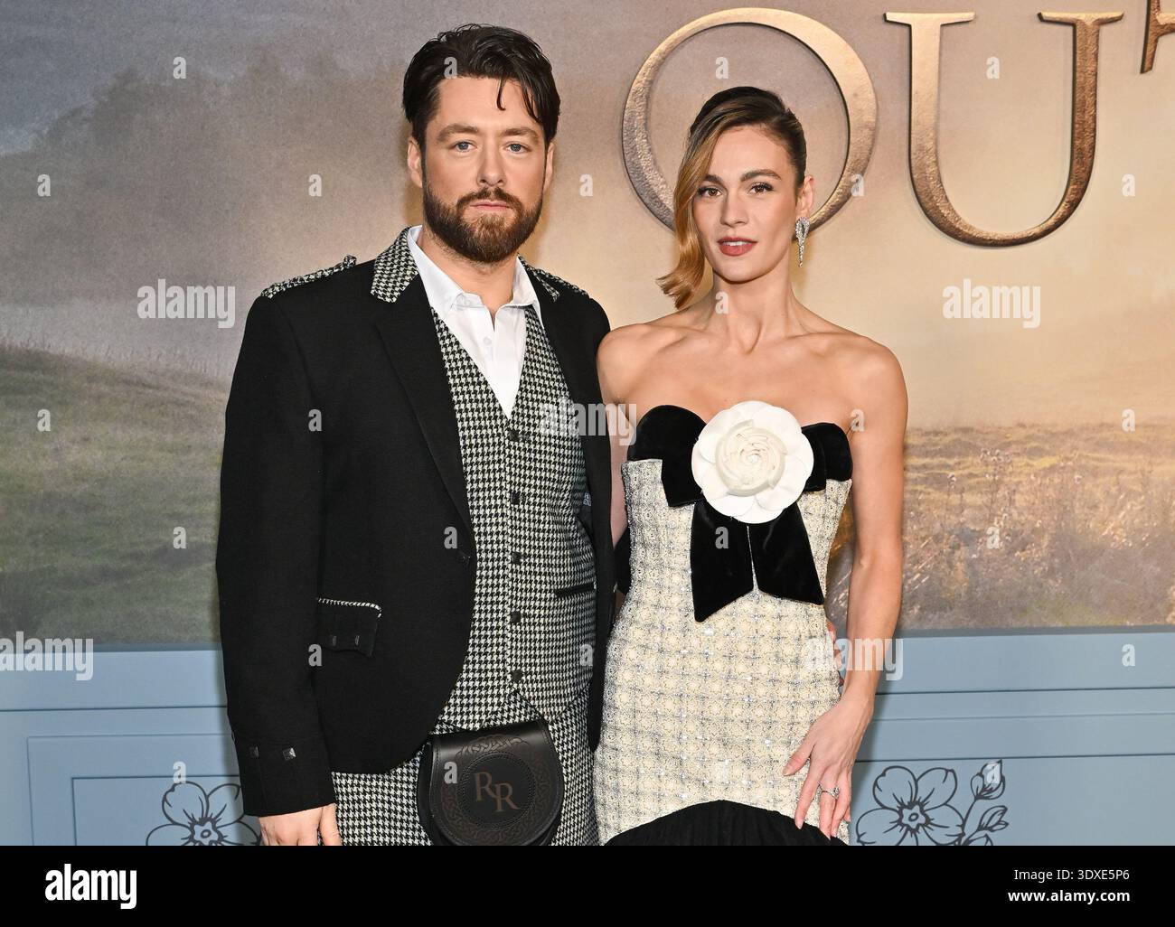 Richard Rankin, left, and Sophie Skelton attend the STARZ premiere of ...