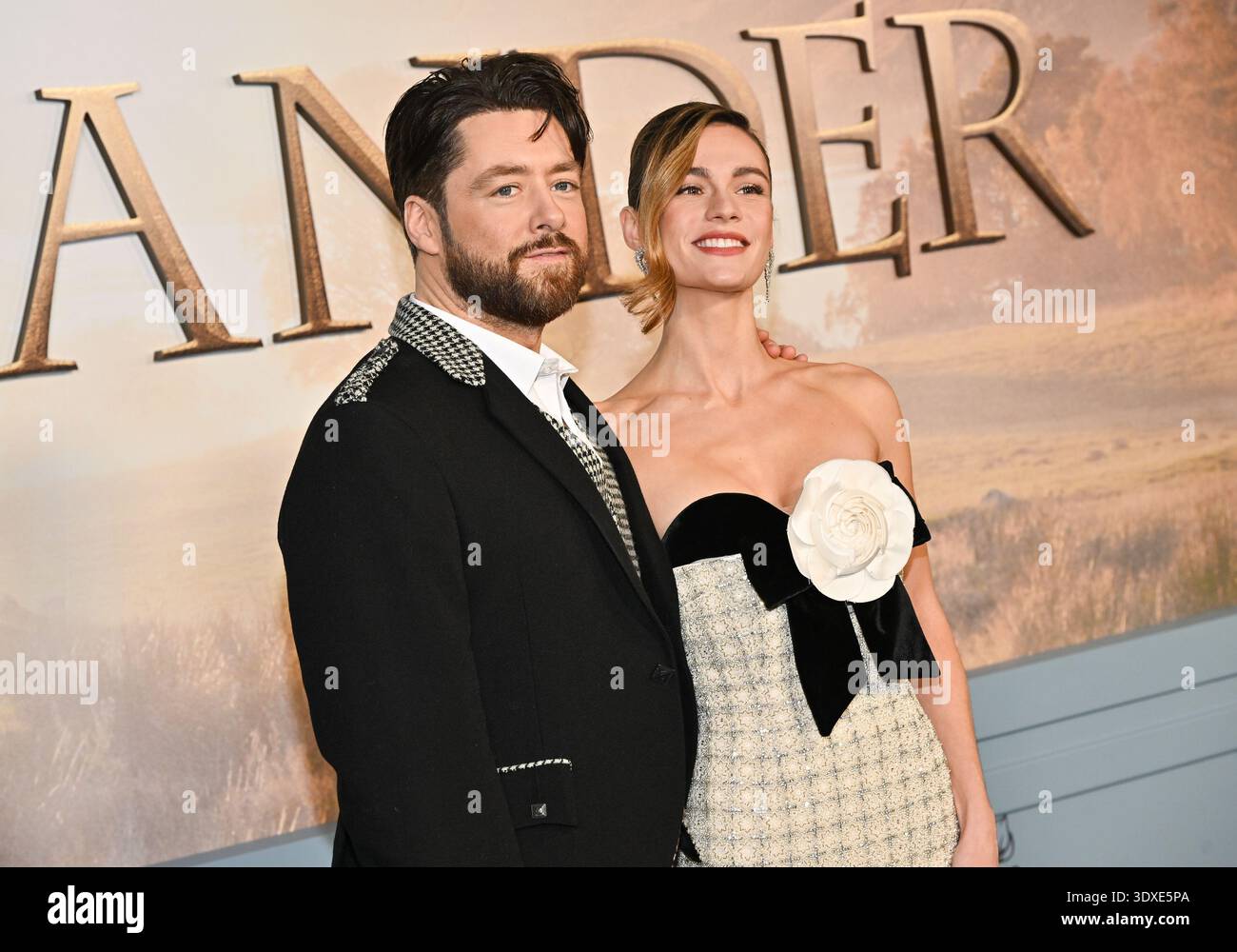 Richard Rankin, left, and Sophie Skelton attend the STARZ premiere of ...