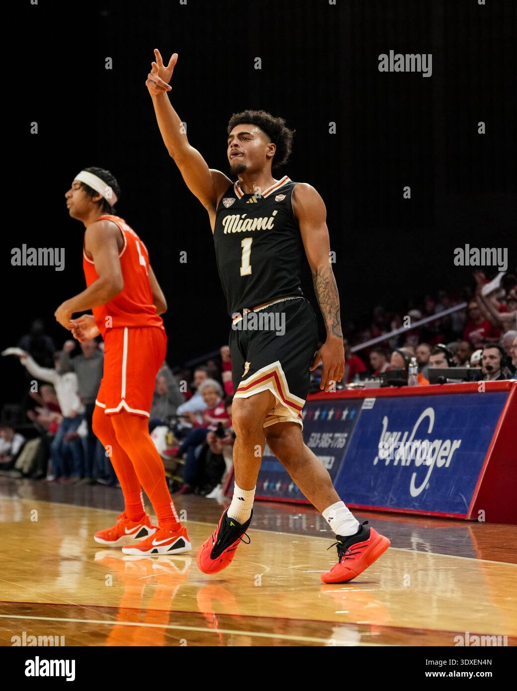 Miami (Ohio) guard Trey Perry (1) reacts after scoring during an NCAA ...