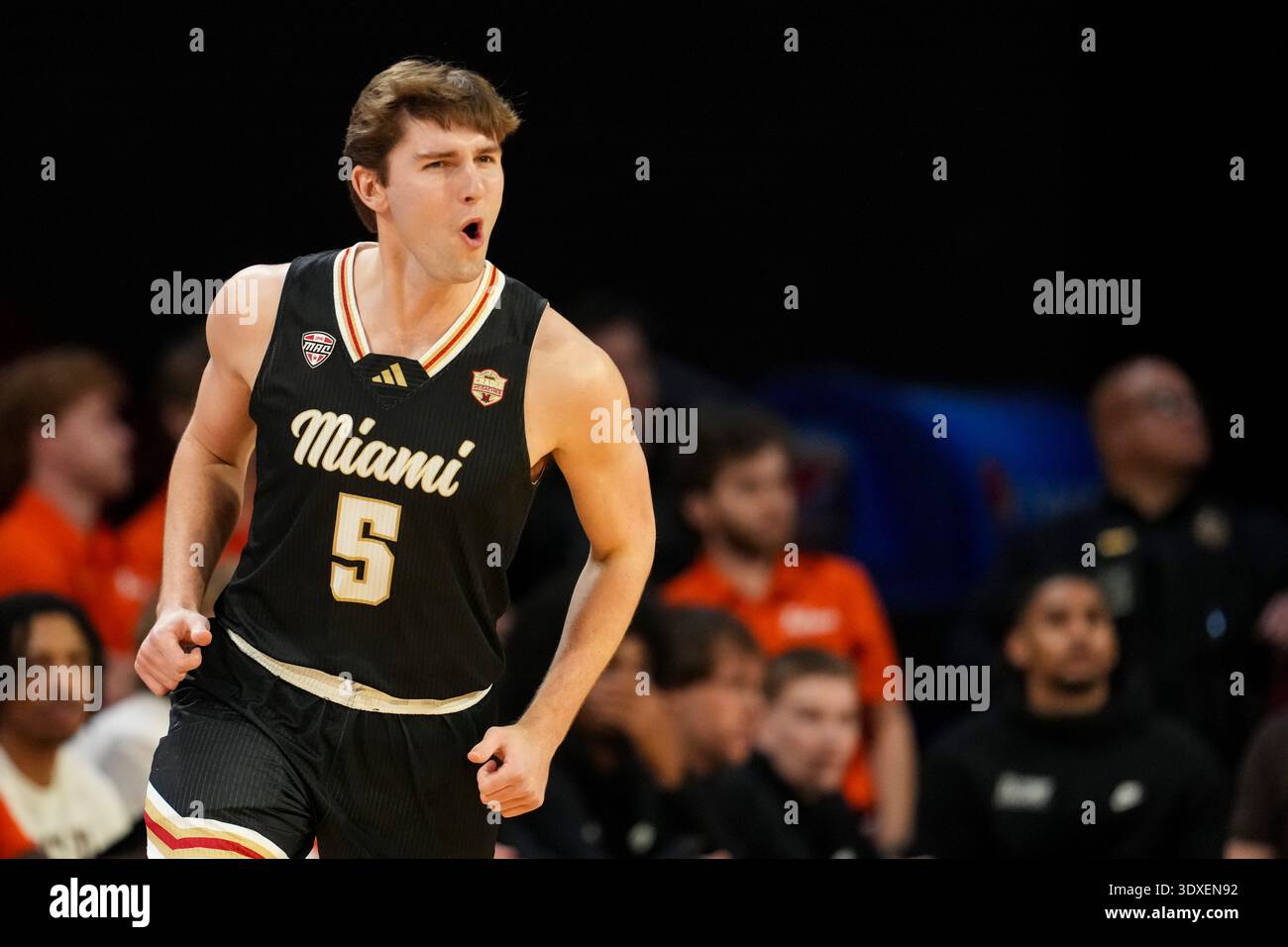Miami (Ohio) guard Peter Suder (5) reacts after scoring during an NCAA ...