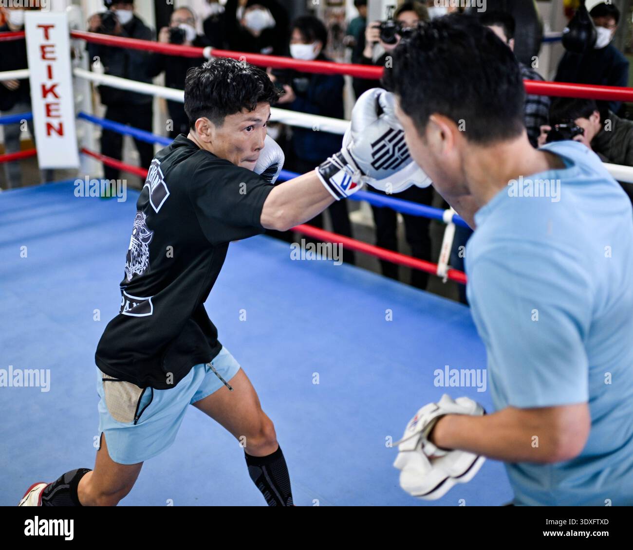 Japan's Shokichi Iwata, left, trains with trainer Sendai Tanaka during ...