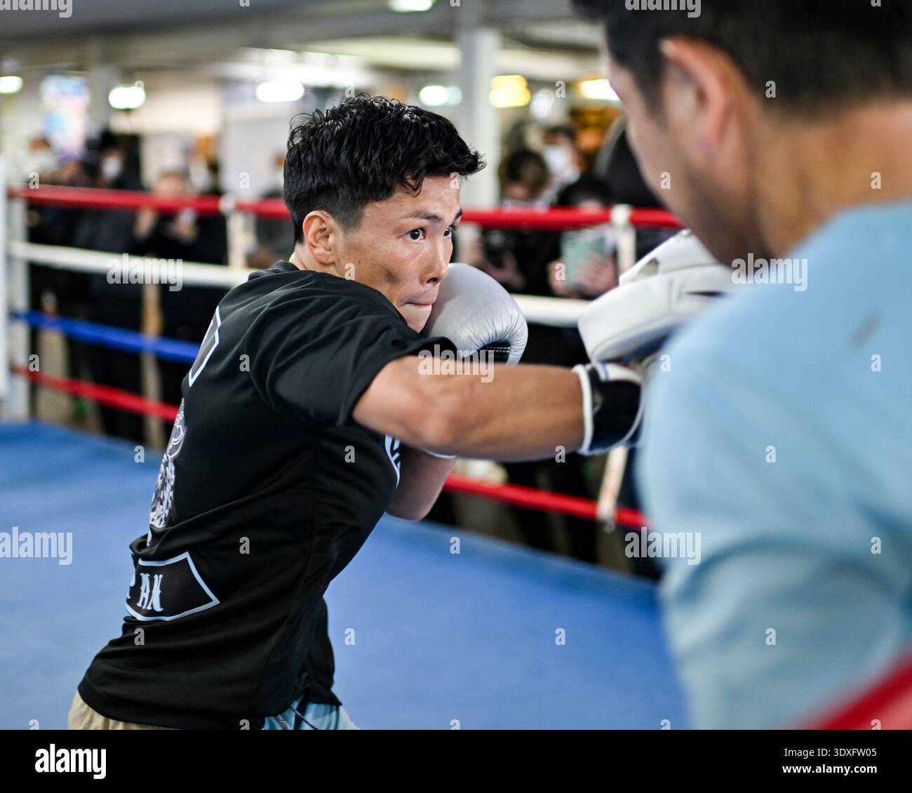 Japan's Shokichi Iwata, left, trains with trainer Sendai Tanaka during ...