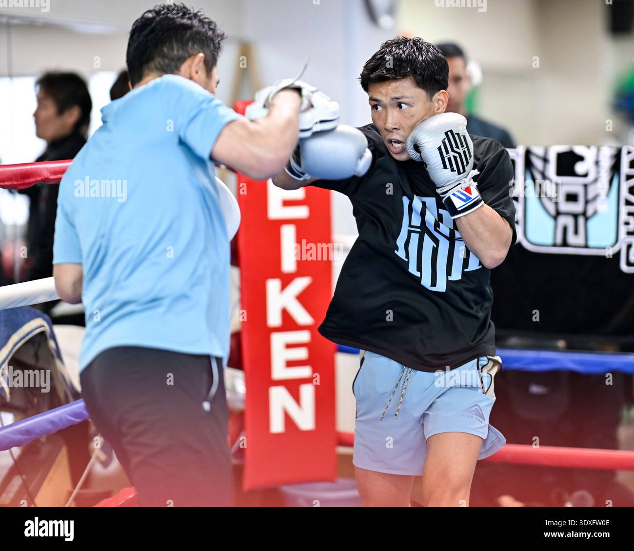 Japan's Shokichi Iwata, right, trains with trainer Sendai Tanaka during ...