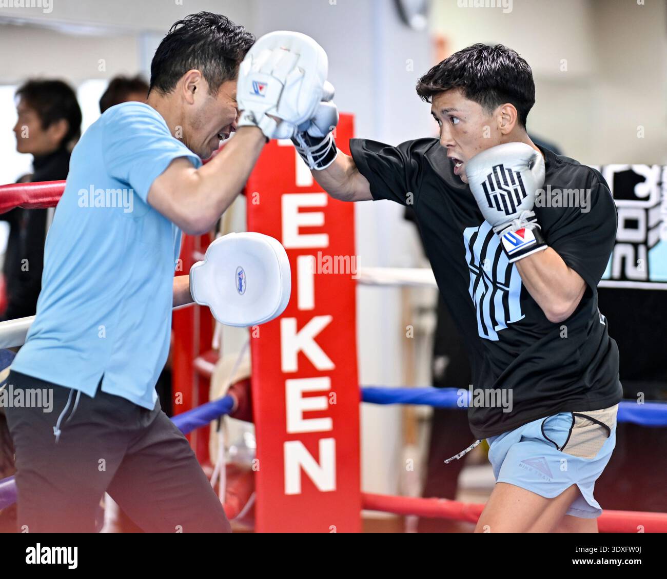 Japan's Shokichi Iwata, right, trains with trainer Sendai Tanaka during ...