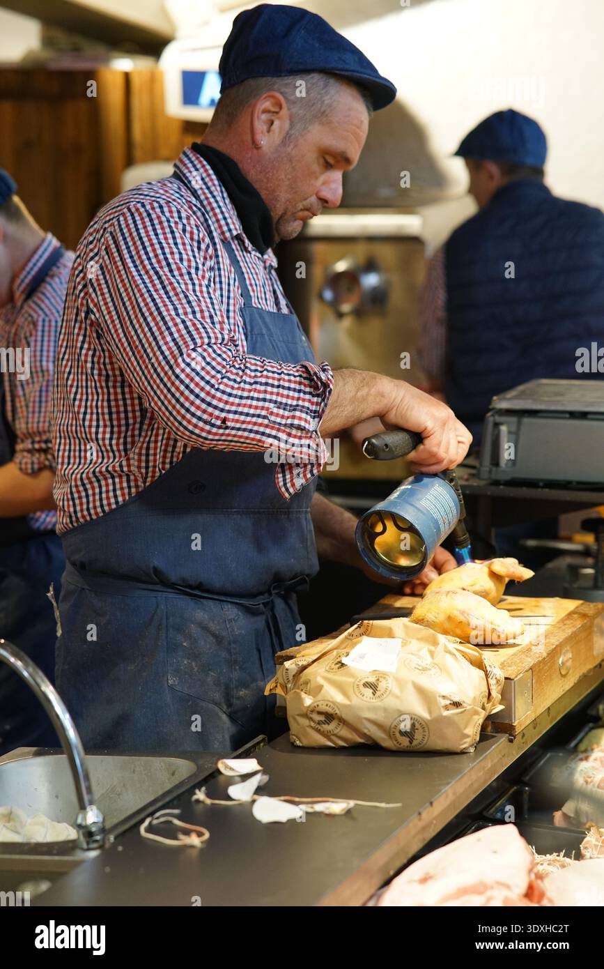 Butcher torching poultry hi-res stock photography and images - Alamy