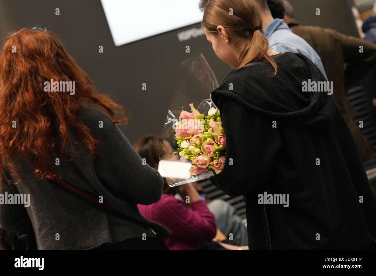 Parents waiting for their children returning from Dubai at Malpensa ...