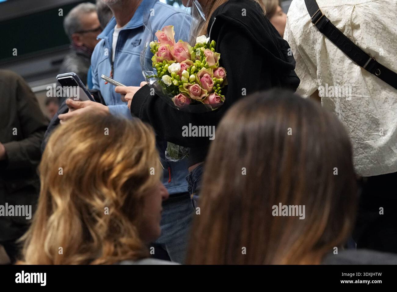 Parents waiting for their children returning from Dubai at Malpensa ...