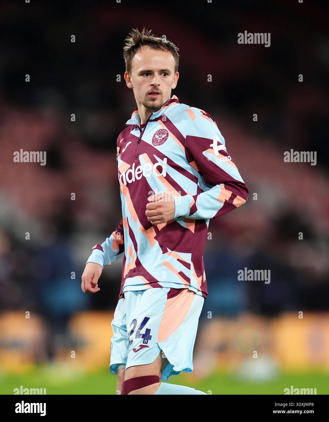 Brentford's Mikkel Damsgaard warming up ahead of the Premier League ...