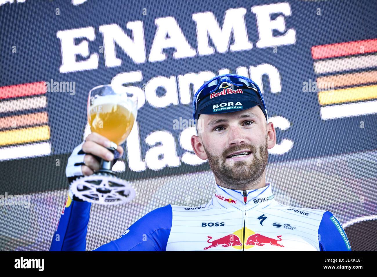 Belgian Jordi Meeus of Red Bull-BORA-hansgrohe celebrates on the podium ...
