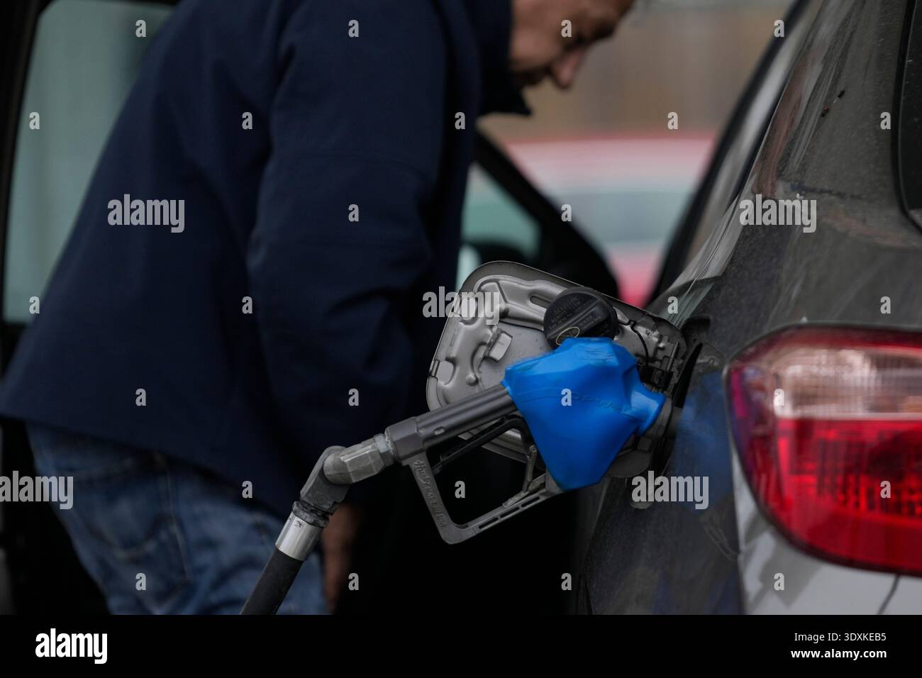 A vehicle is fueled at a gas station Tuesday, March 3, 2026, in Chicago ...
