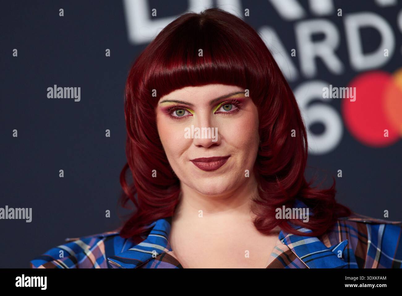 CMAT poses for photographers upon arrivals during the Brit Awards 2026 ...