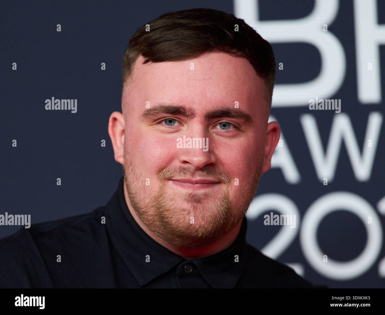 Luke Littler poses for photographers upon arrival at the Brit Awards ...