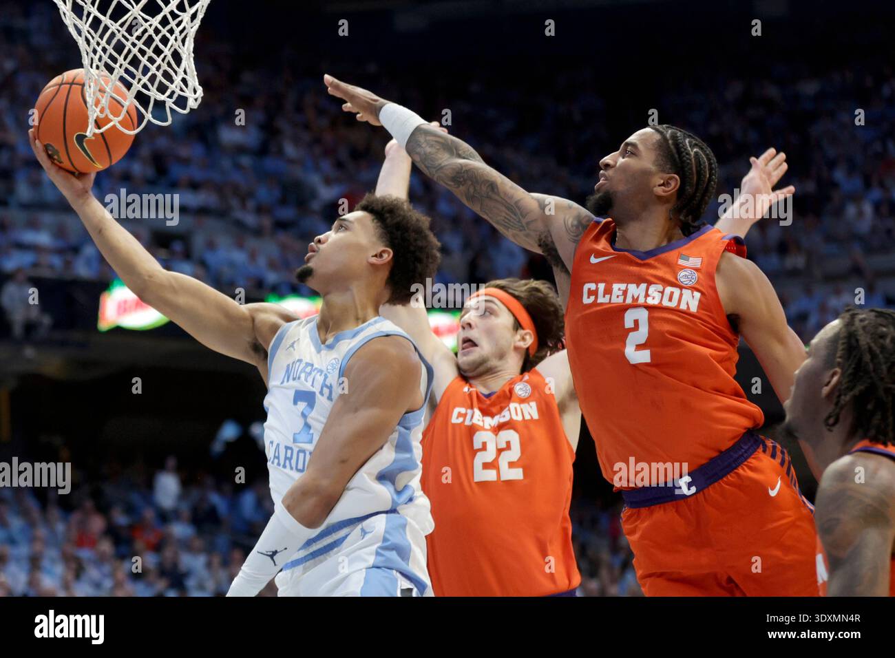North Carolina guard Seth Trimble (7) drives against Clemson center ...