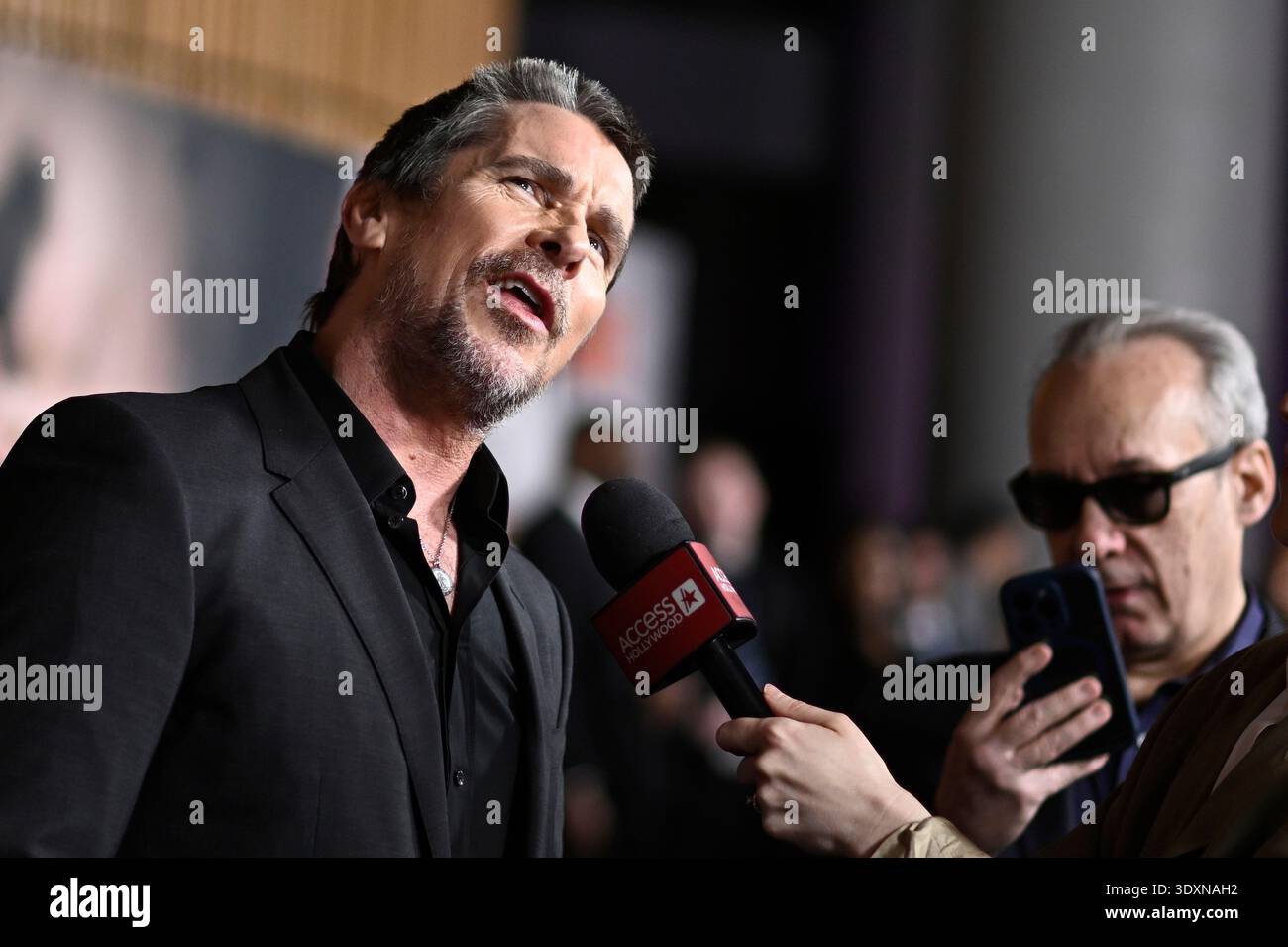 Christian Bale walking the red carpet at the US Premiere of 'The Bride ...