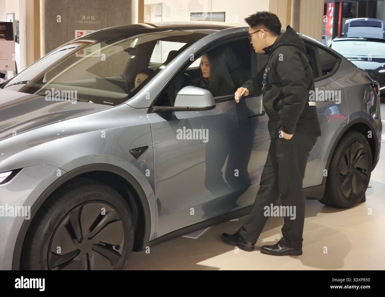 Tesla's Cybertruck with its distinctive stainless steel exoskeleton ...
