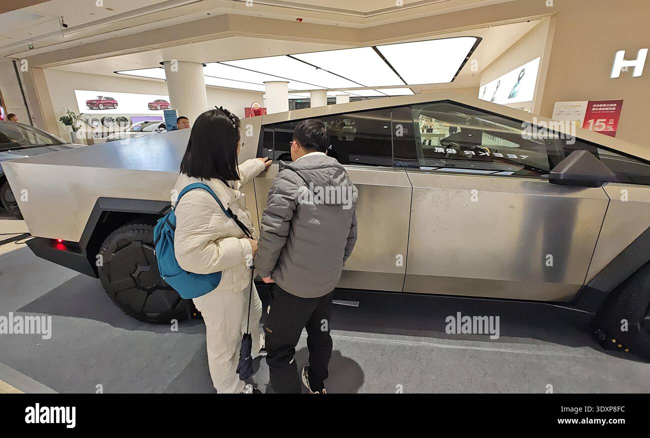Tesla's Cybertruck with its distinctive stainless steel exoskeleton ...
