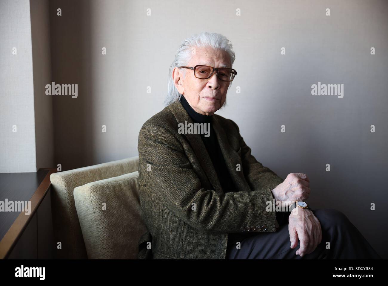 Japanese novelist Hiroyuki Itsuki poses for photo during an interview ...