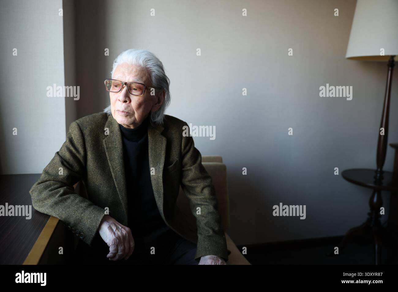 Japanese novelist Hiroyuki Itsuki poses for photo during an interview ...