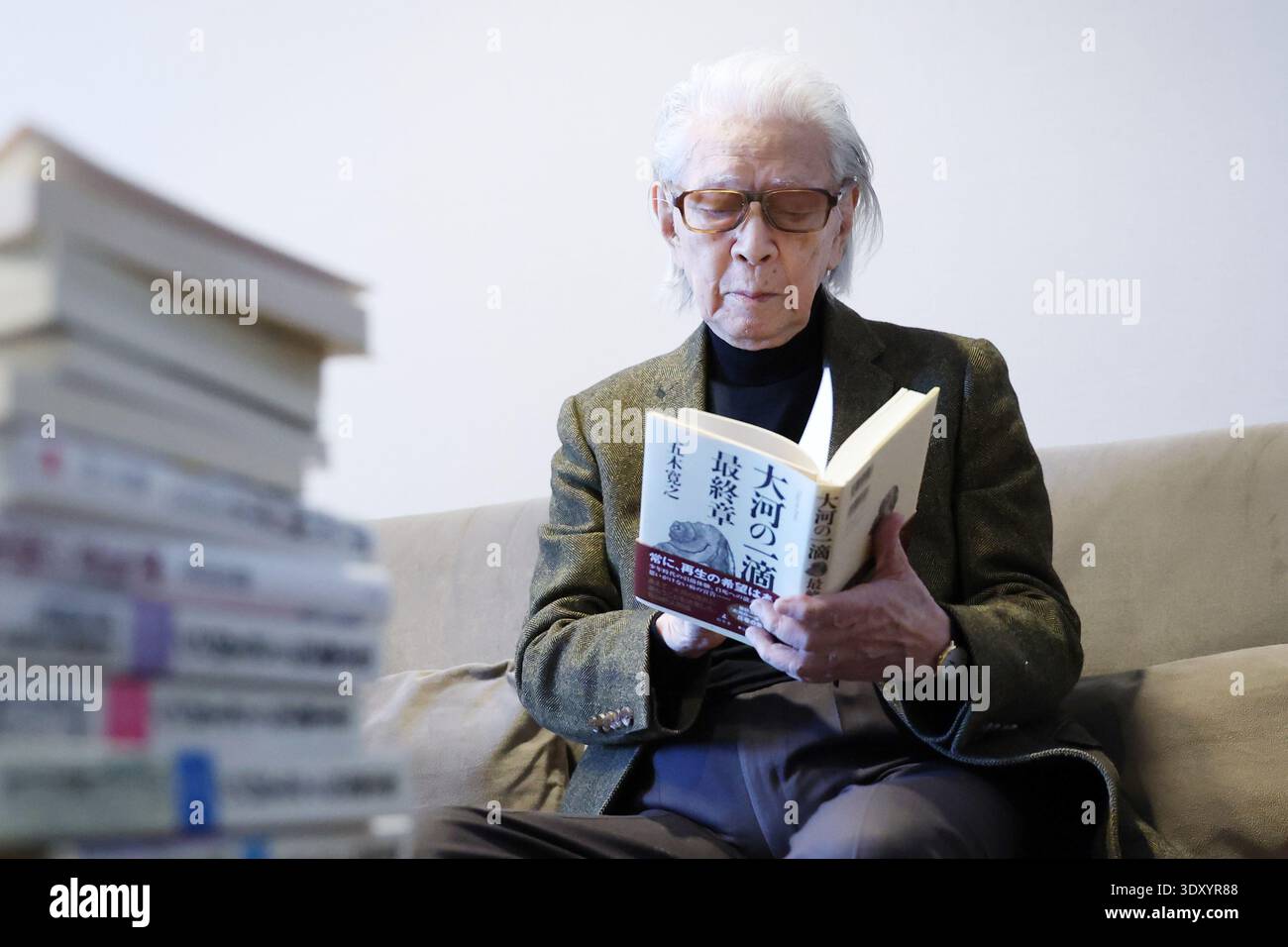 Japanese novelist Hiroyuki Itsuki poses for photo during an interview ...